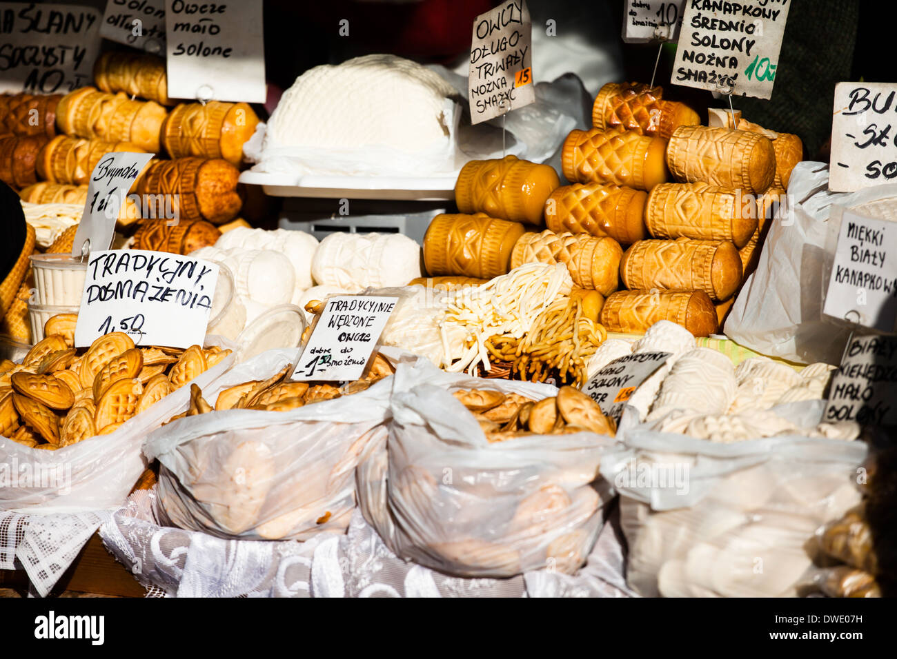 Traditional polish smoked cheese oscypek on outdoor market in Zakopane ...