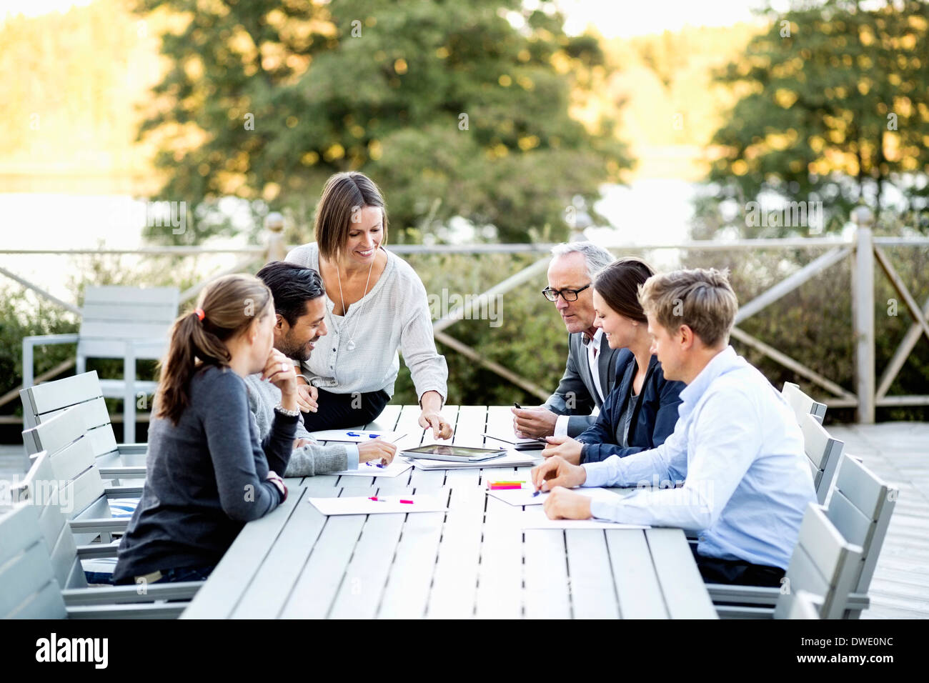 People seated table seminar hi-res stock photography and images - Alamy