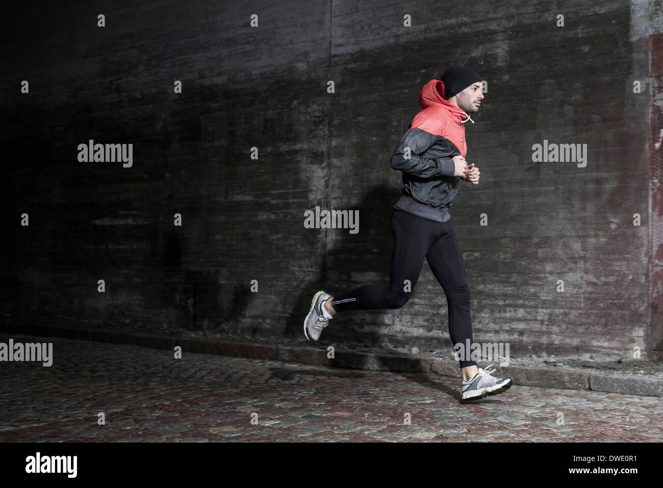 Jogging wall hi-res stock photography and images - Alamy