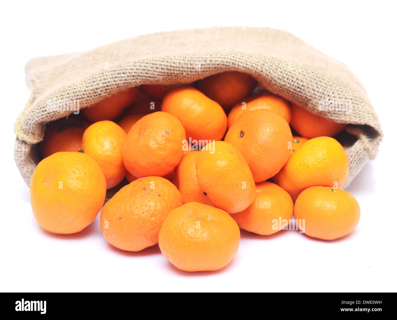 tangerines in sack isolated on white background Stock Photo - Alamy