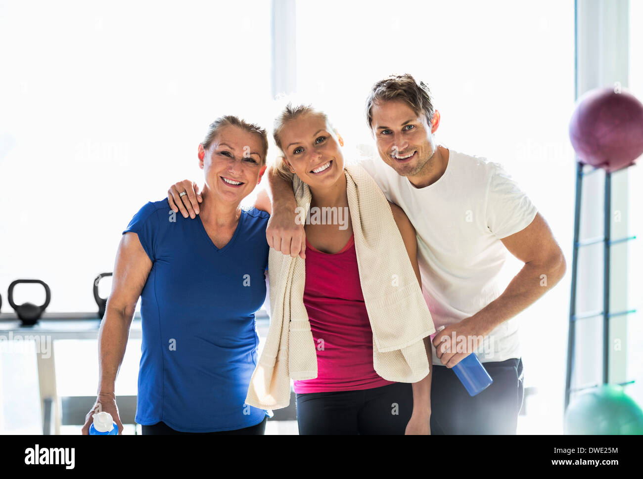 Portrait of happy friends at health club Stock Photo - Alamy