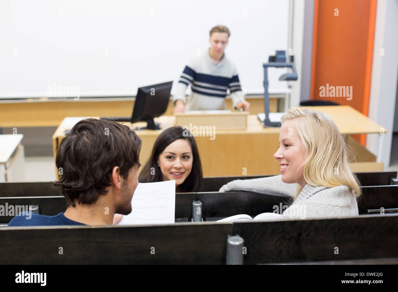 University students discussing in classroom Stock Photo - Alamy