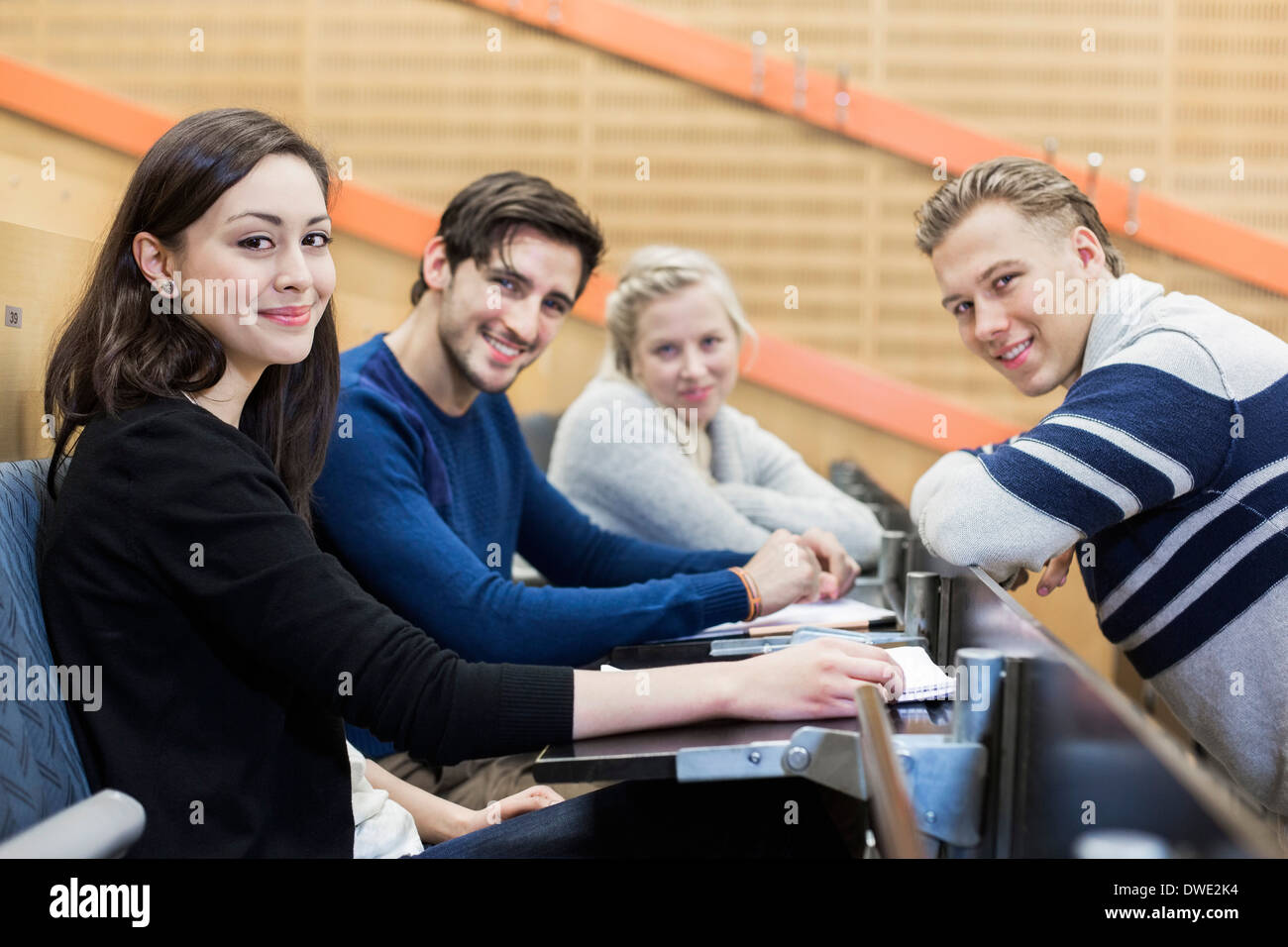 Portrait of confident university students in classroom Stock Photo - Alamy