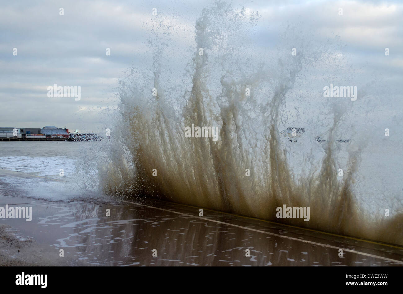 Waves hitting a sea wall Stock Photo - Alamy
