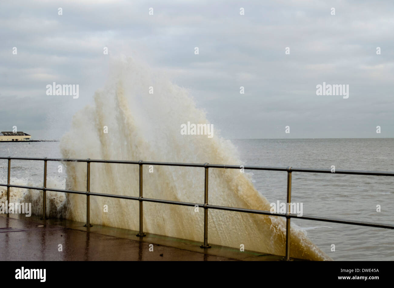 Waves hitting a sea wall Stock Photo - Alamy