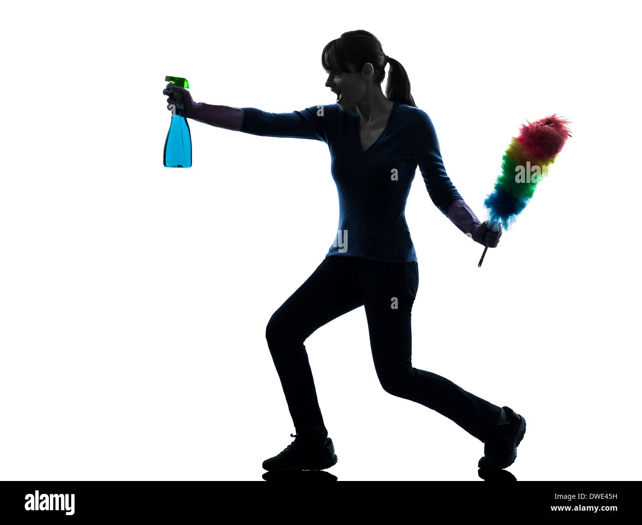 one woman maid dust cleaning in silhouette studio isolated on white ...