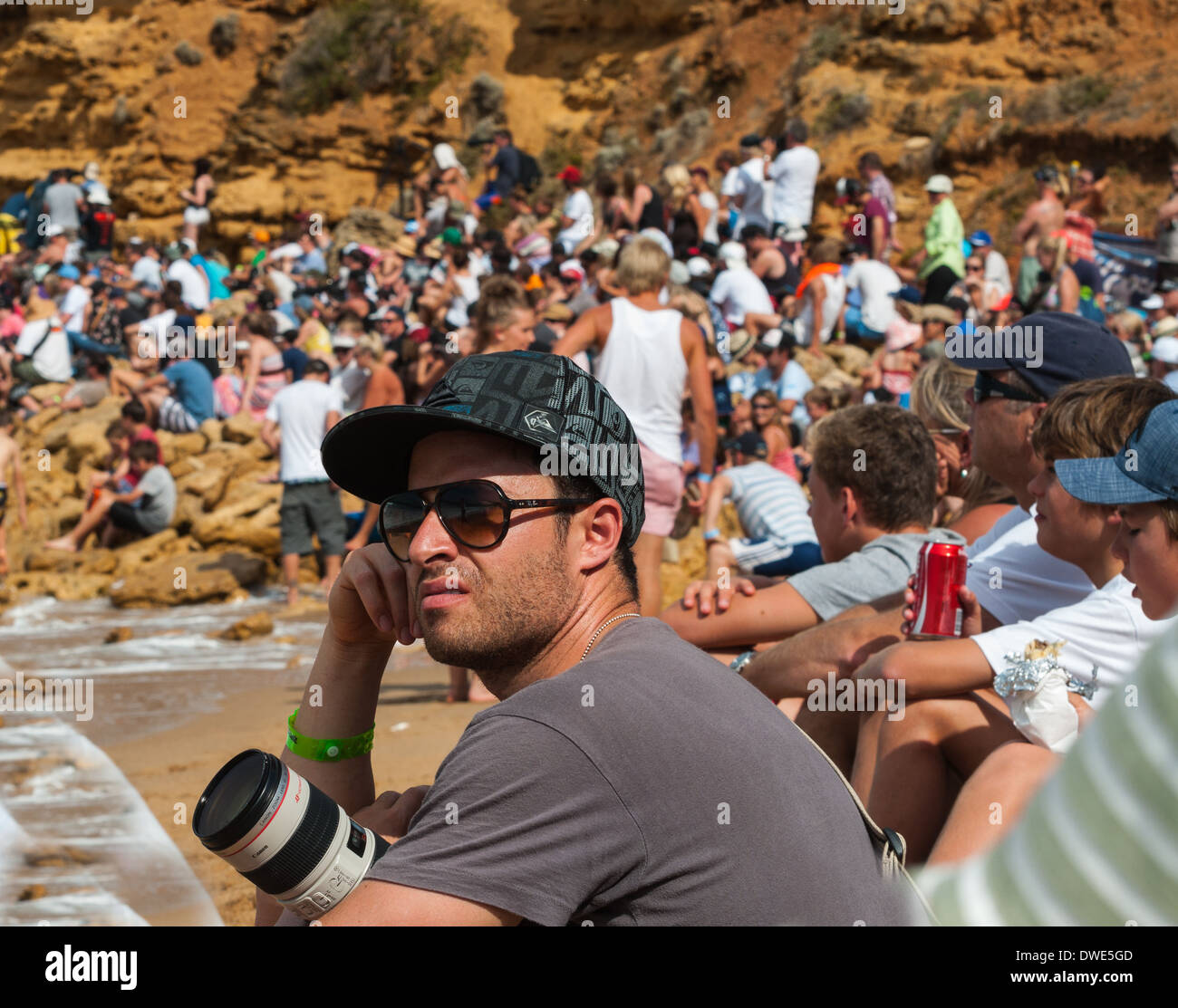 Camera man photographer on the shore line at the Bells Beach surf ...