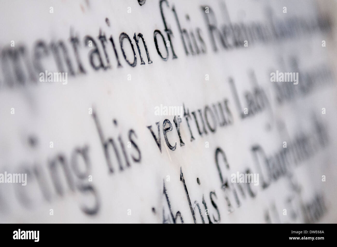 Close up of an inscription on an epitaph inside the Church of St Peter ...