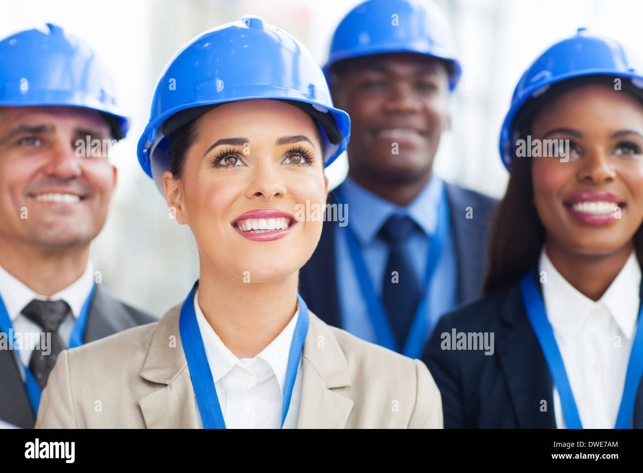 group of professional construction managers looking up Stock Photo - Alamy