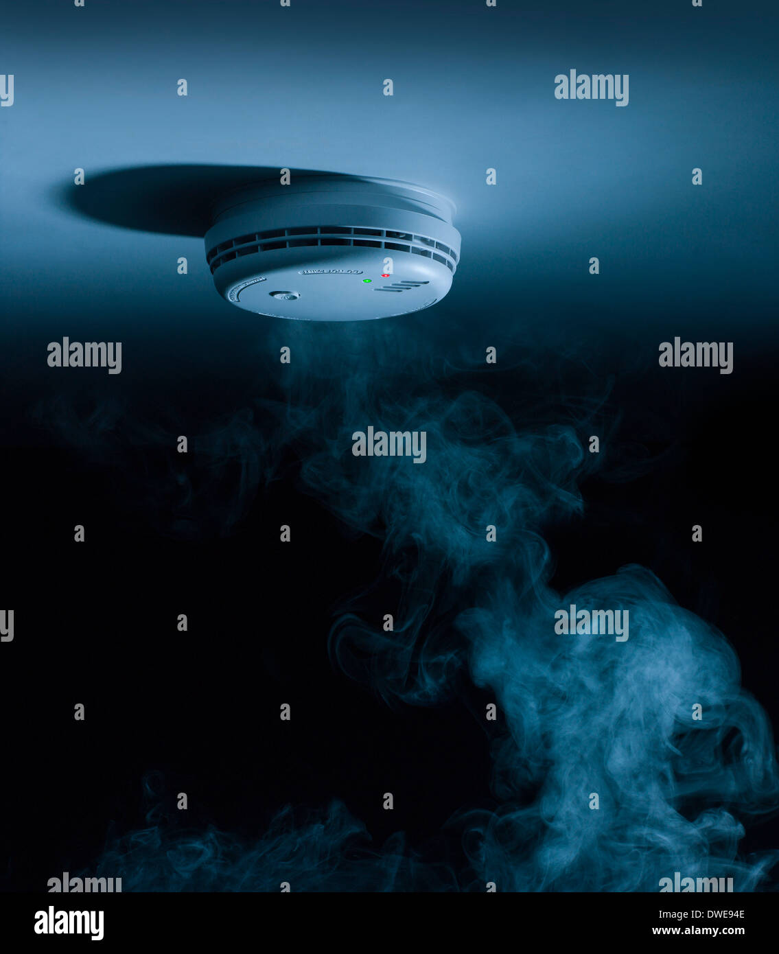 Smoke alarm damaged by fire Stock Photo - Alamy