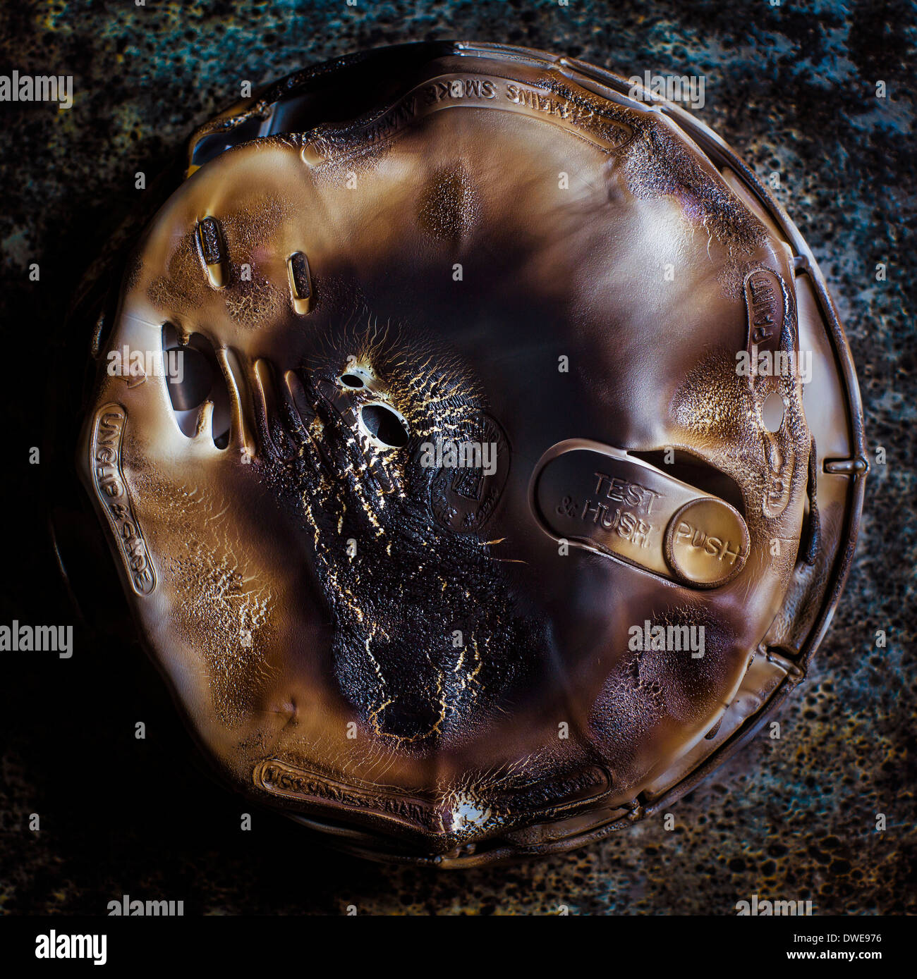 Smoke alarm damaged by fire Stock Photo - Alamy