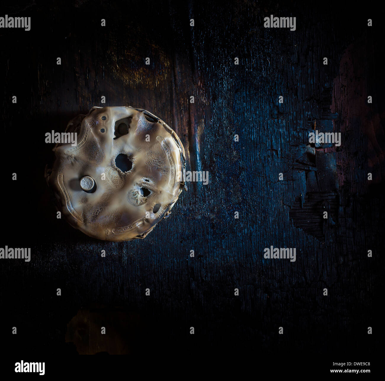 Smoke alarm damaged by fire Stock Photo - Alamy
