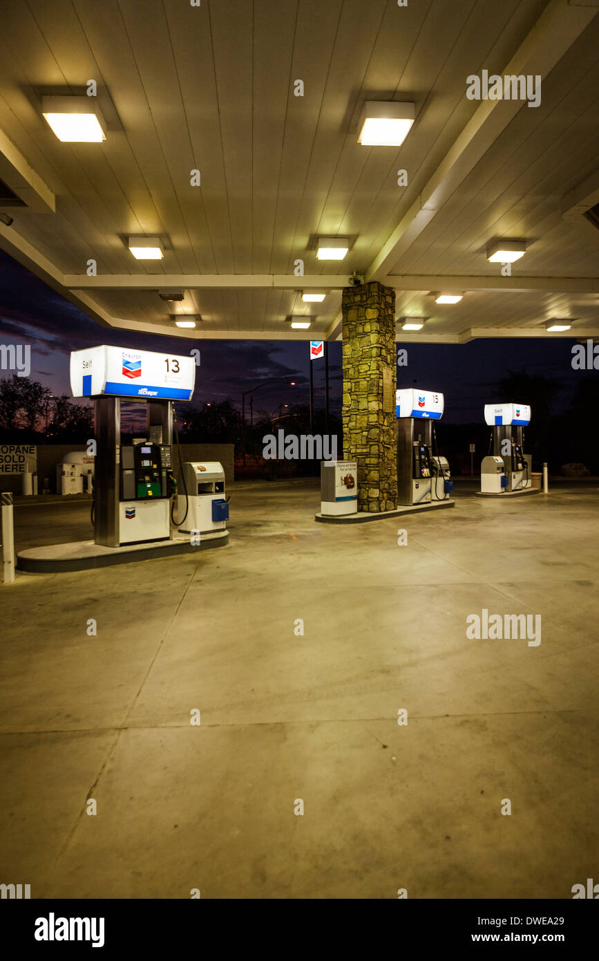 The pumps of a gas station in an Arizona desert at night Stock Photo ...