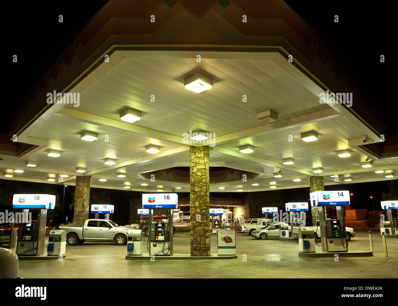The pumps of a gas station in an Arizona desert at night Stock Photo ...
