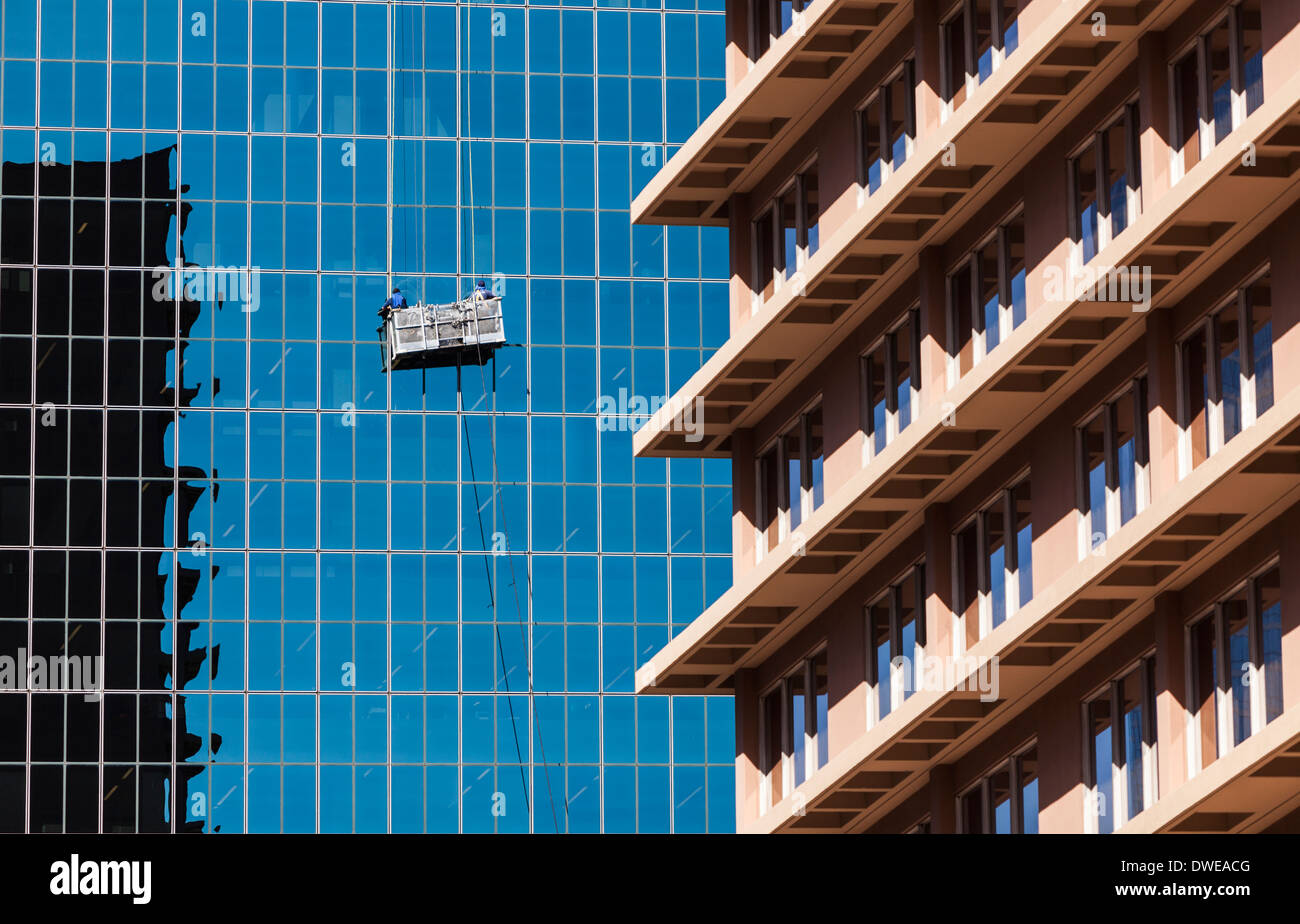 Window cleaners tackle the monumental task of cleaning a skyscraper ...