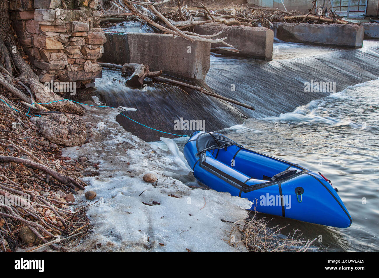 a packraft (one-person light raft used for expedition or adventure ...