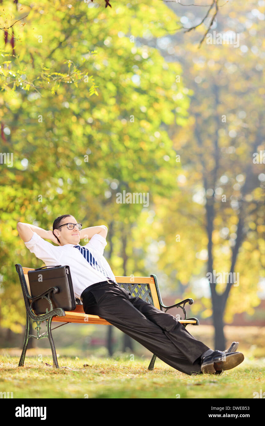 Relaxed man sitting outside hi-res stock photography and images - Alamy