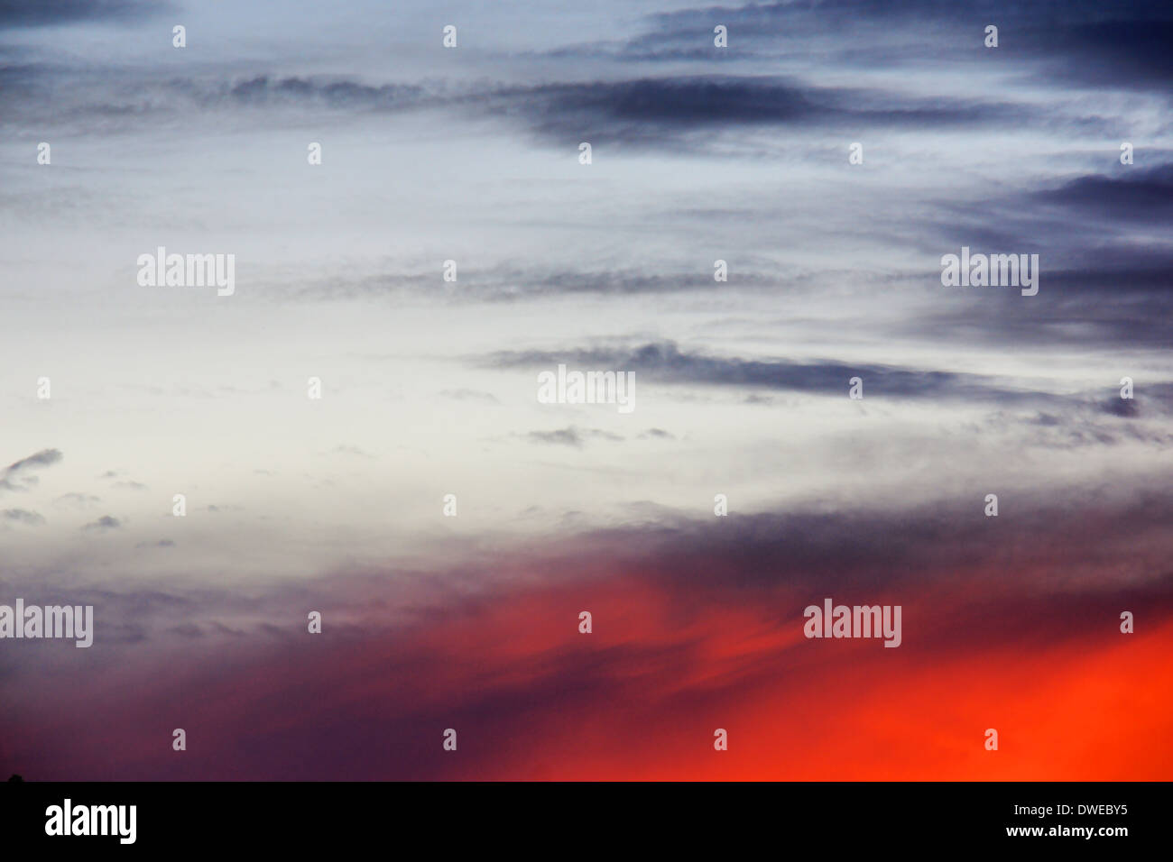 Dramatic red inferno sunset with light sky contrast, nature background ...