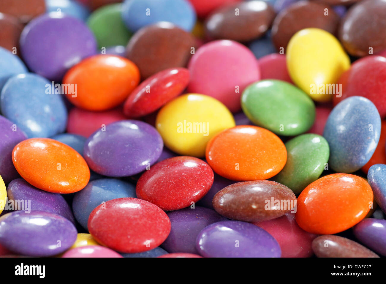 Food background, candy coated milk chocolate, fading depth of field ...