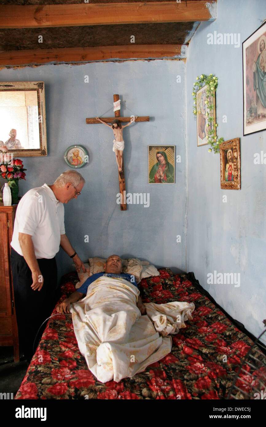 Catholic priest last rites sick hi-res stock photography and images - Alamy