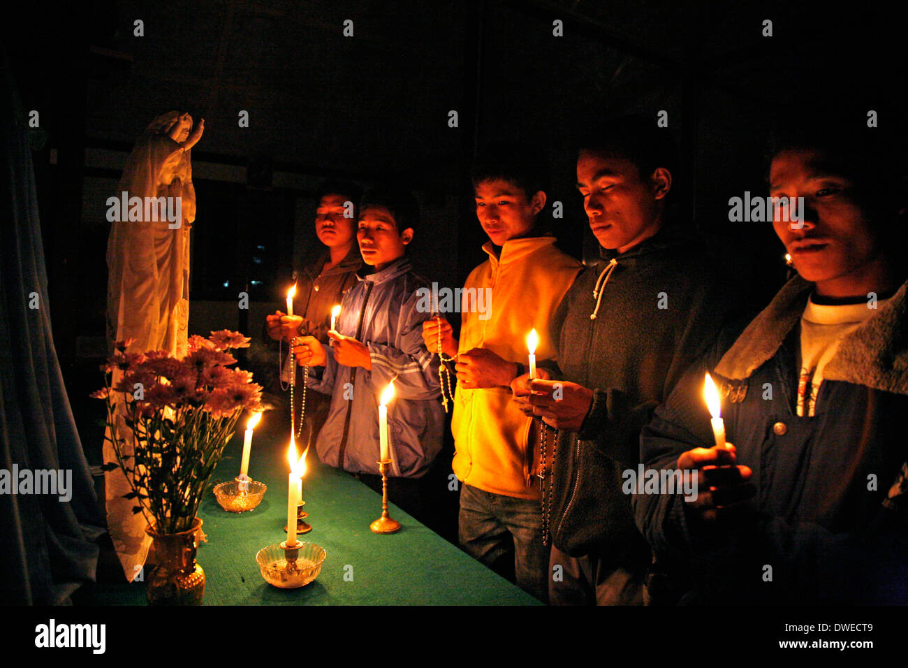 BURMA Young seminarians praying Stock Photo - Alamy