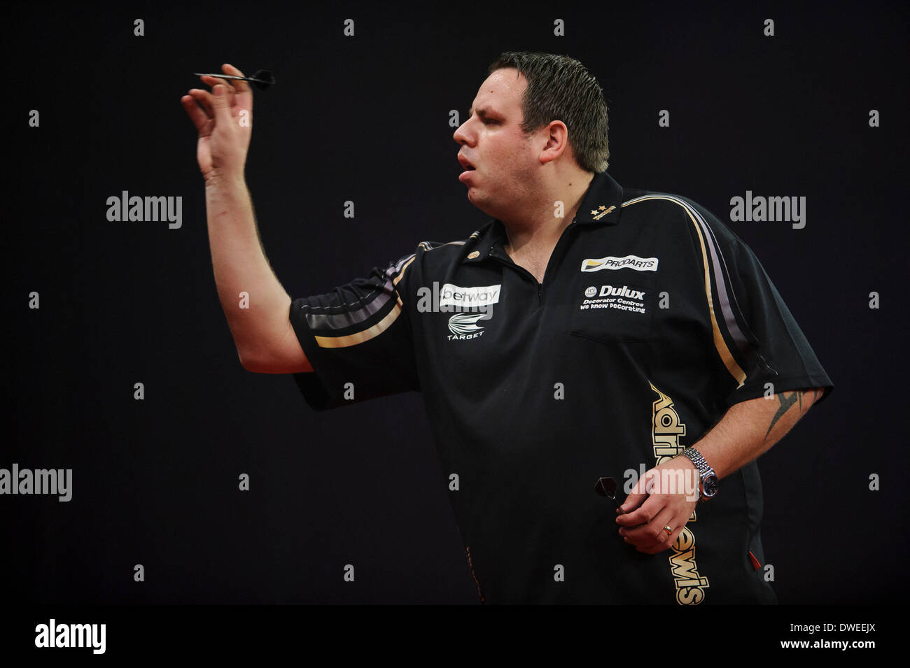 Exeter, UK. 06th Mar, 2014. Adrian Lewis throws against Michael van ...