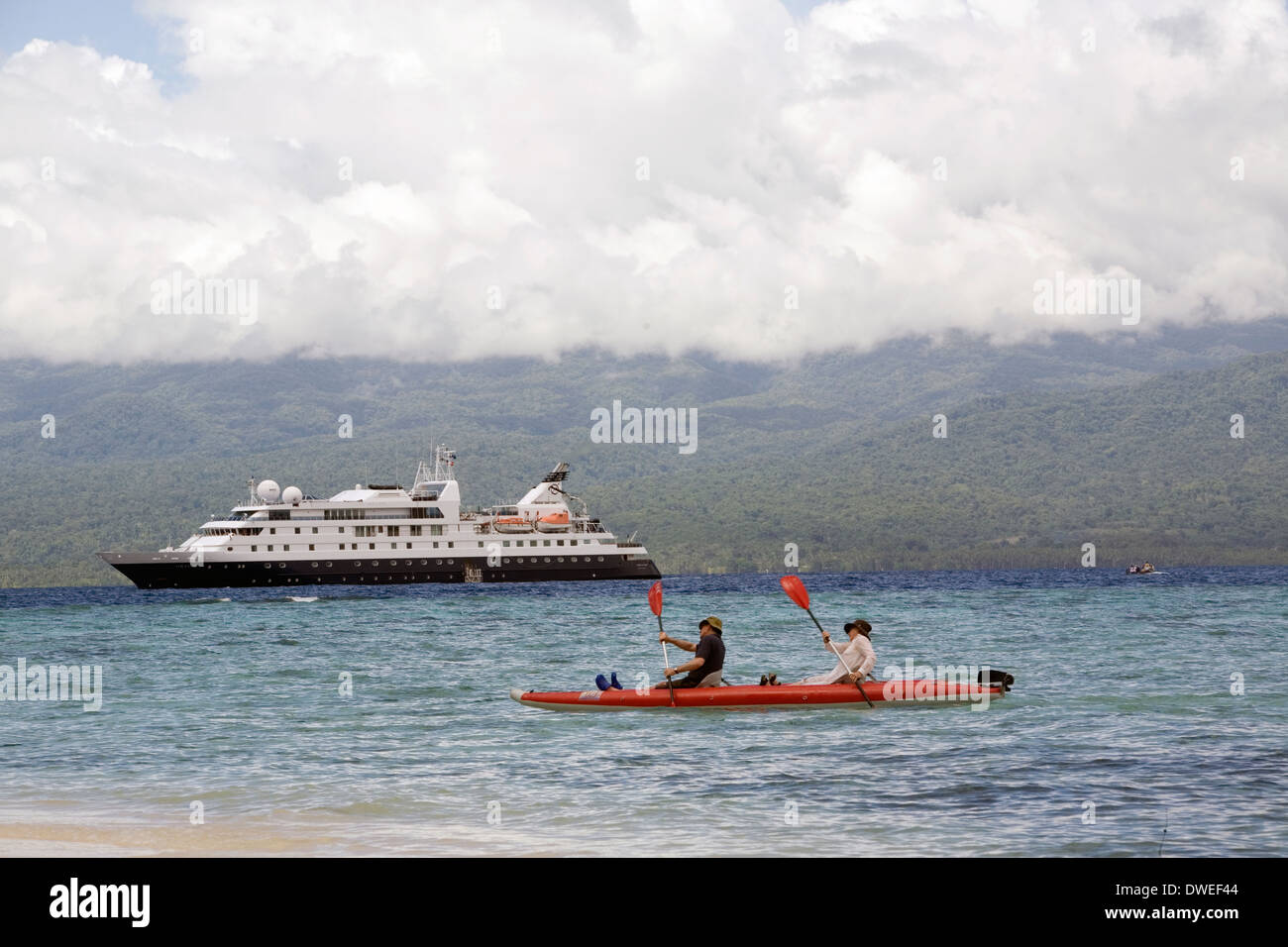 Passengers from the Aussie expedition cruiser Orion enjoy a kayak ride ...
