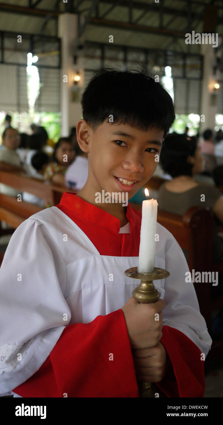 Altar boy candle hi-res stock photography and images - Alamy