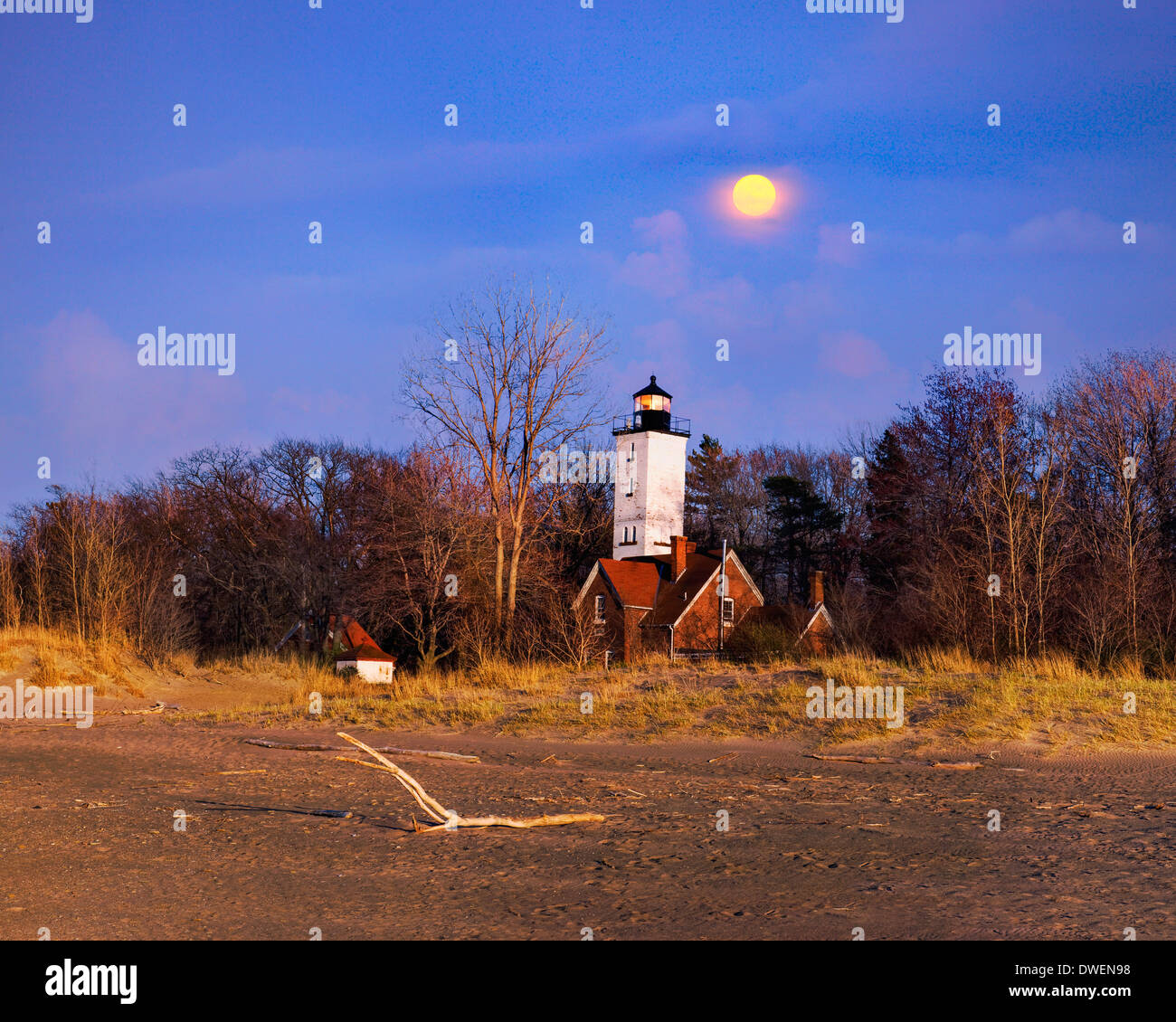 The Presque Isle Lighthouse At Sunset With A Moon OnThe Rise, Erie ...