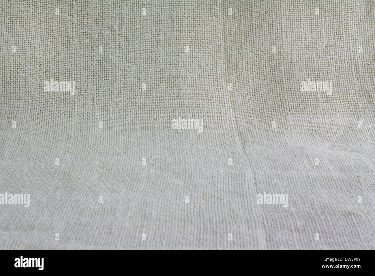 Linen natural canvas background on the basis of fabric Stock Photo - Alamy