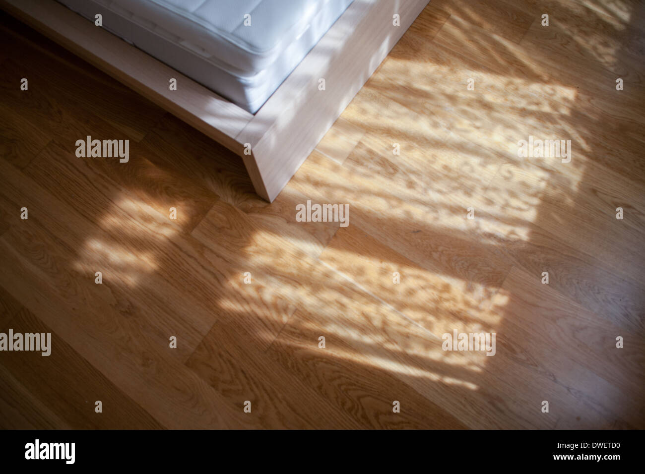 Beautiful shadows from the window on the wooden floor bedrooms Stock ...