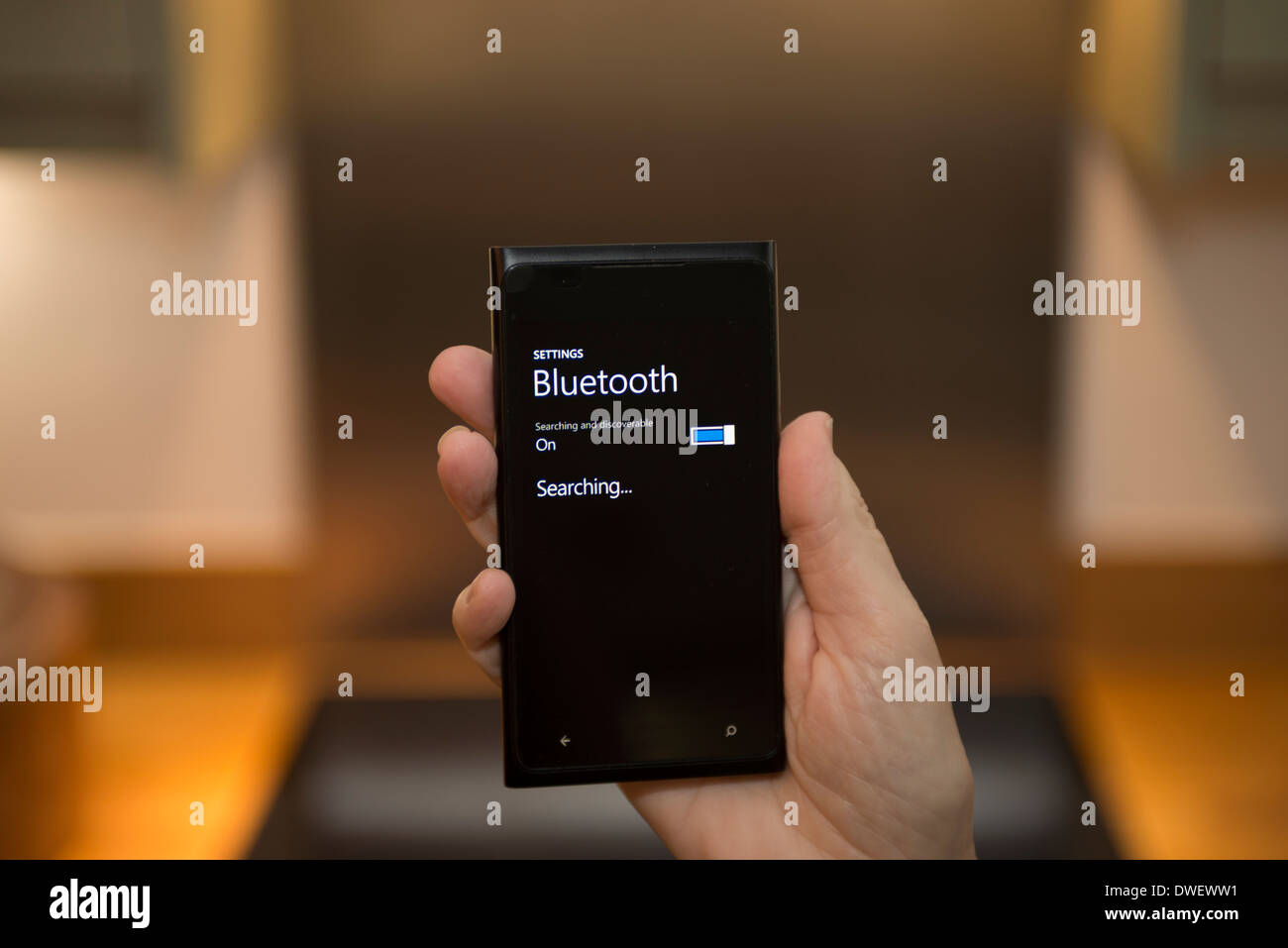 Smartphone communicating and searching via Bluetooth technology Stock ...