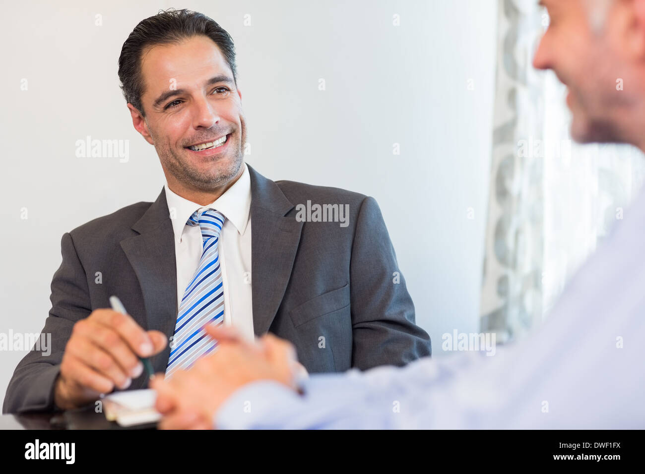 Businessmen doing paperwork desk hi-res stock photography and images - Alamy
