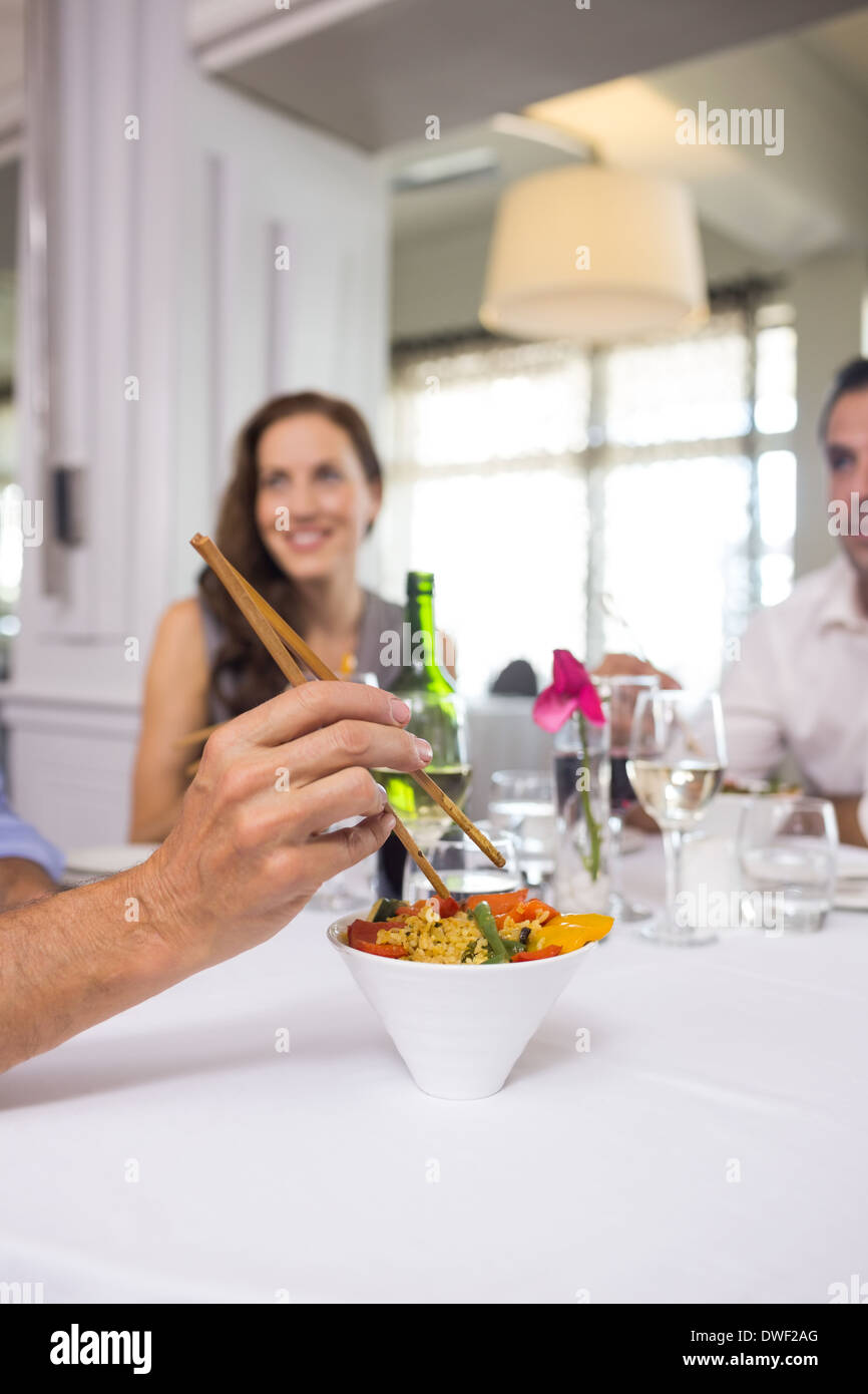 Business colleagues around dining table in restaurant Stock Photo - Alamy