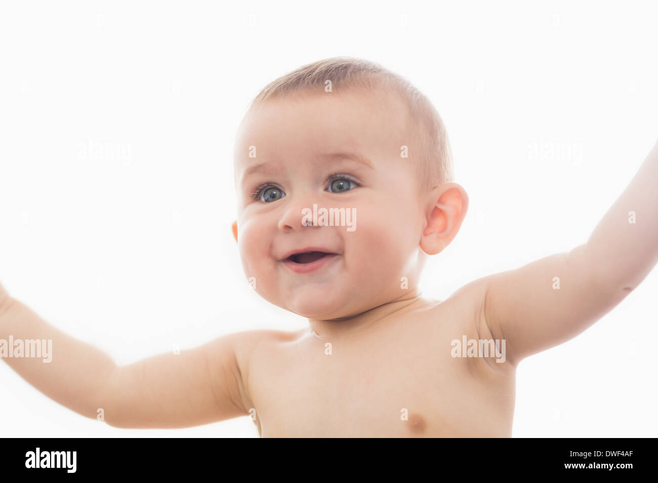 Baby boy with arms outstretched Stock Photo - Alamy