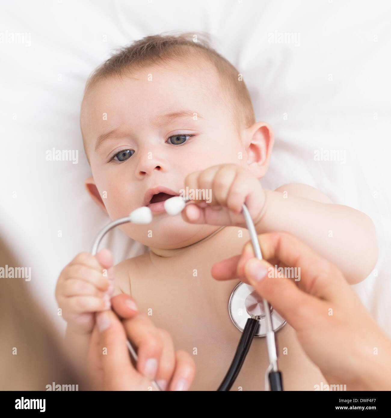Adorable baby playing with stethoscope Stock Photo - Alamy