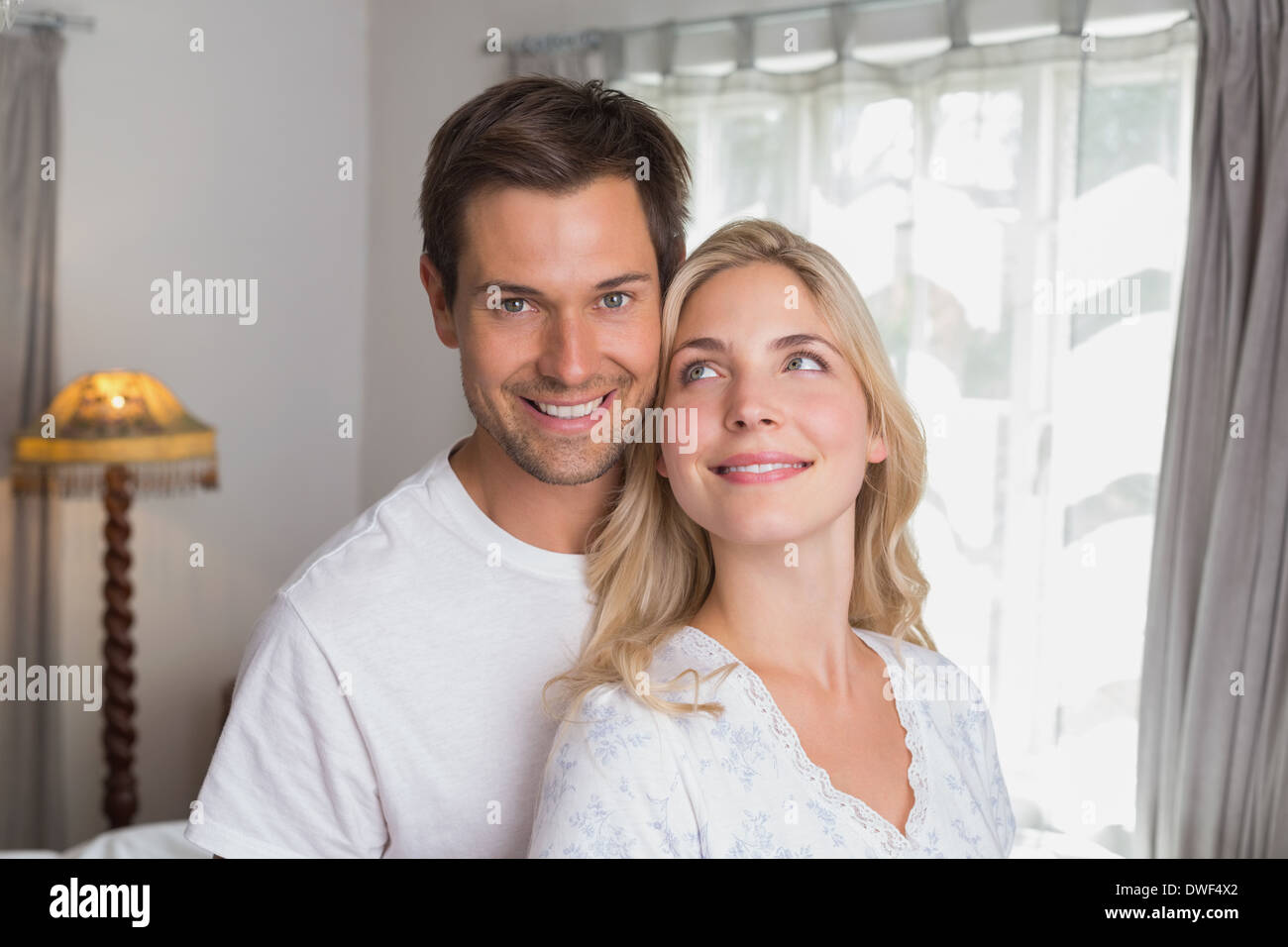 Smiling young couple together hi-res stock photography and images - Alamy