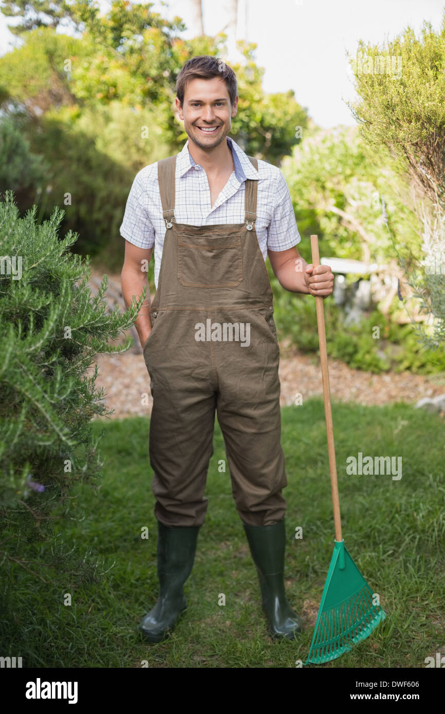 Holding rake hi-res stock photography and images - Alamy