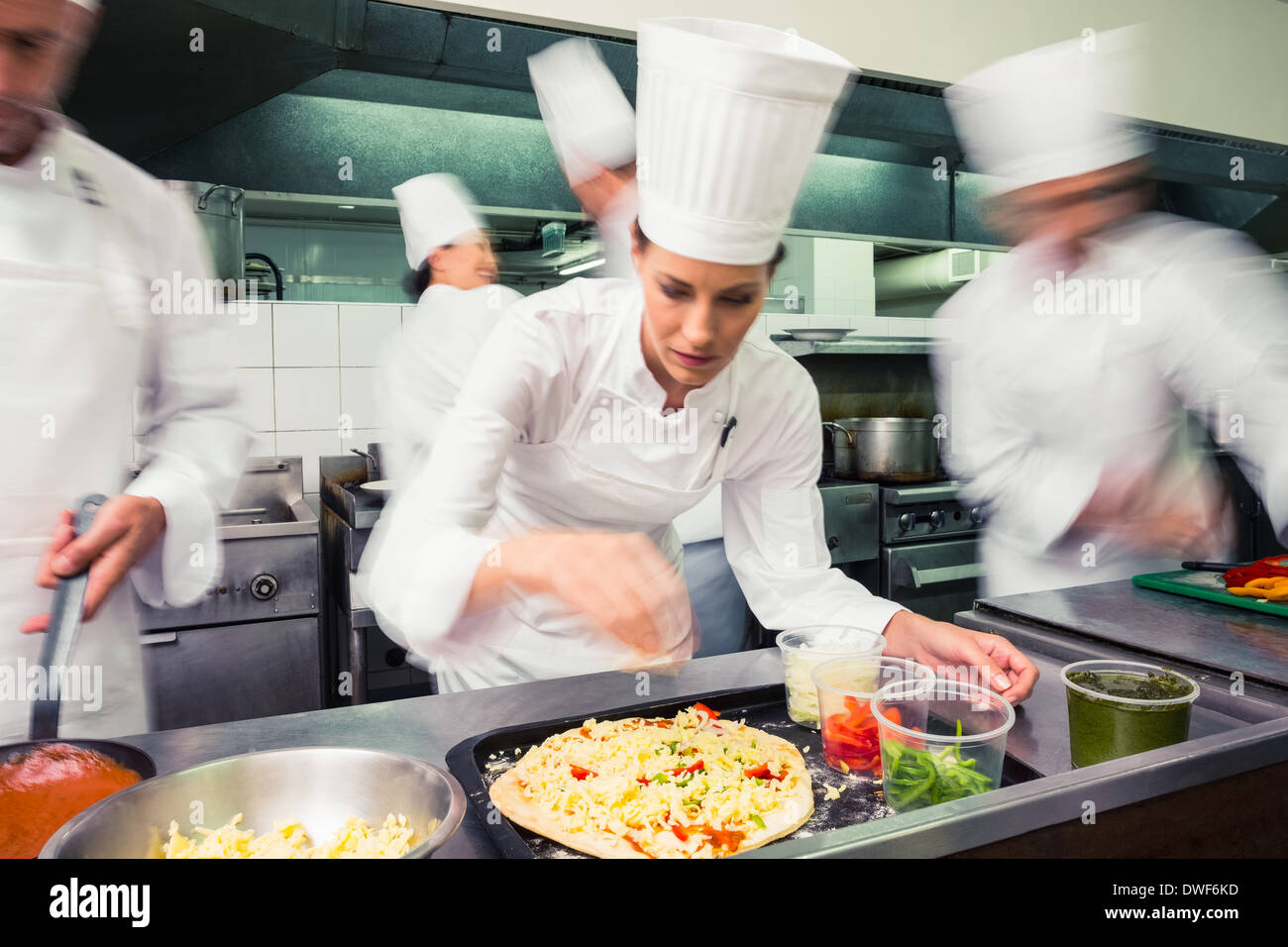 Chefs preparing pizza hi-res stock photography and images - Alamy