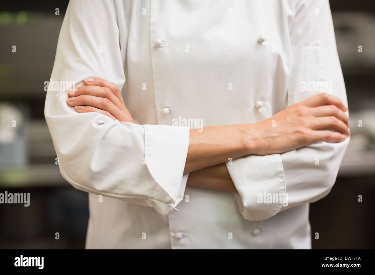 Female chef crossed arms hi-res stock photography and images - Alamy