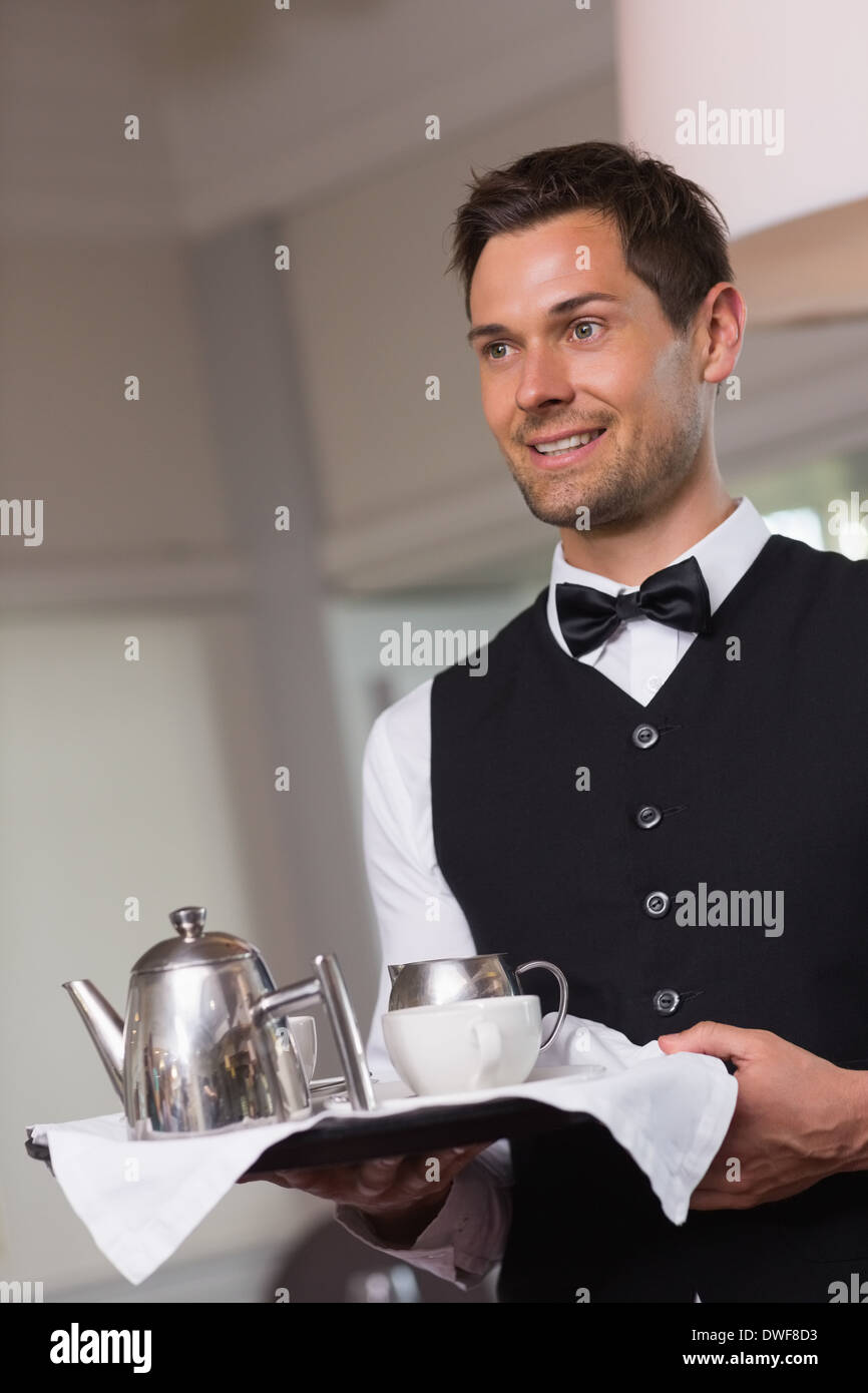 Tea hotel waiter hi-res stock photography and images - Alamy