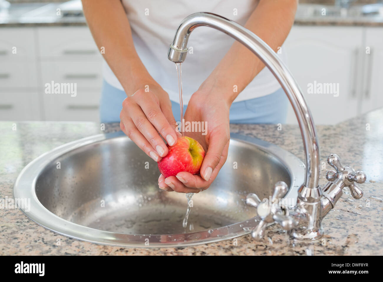 Washing apple hi-res stock photography and images - Alamy