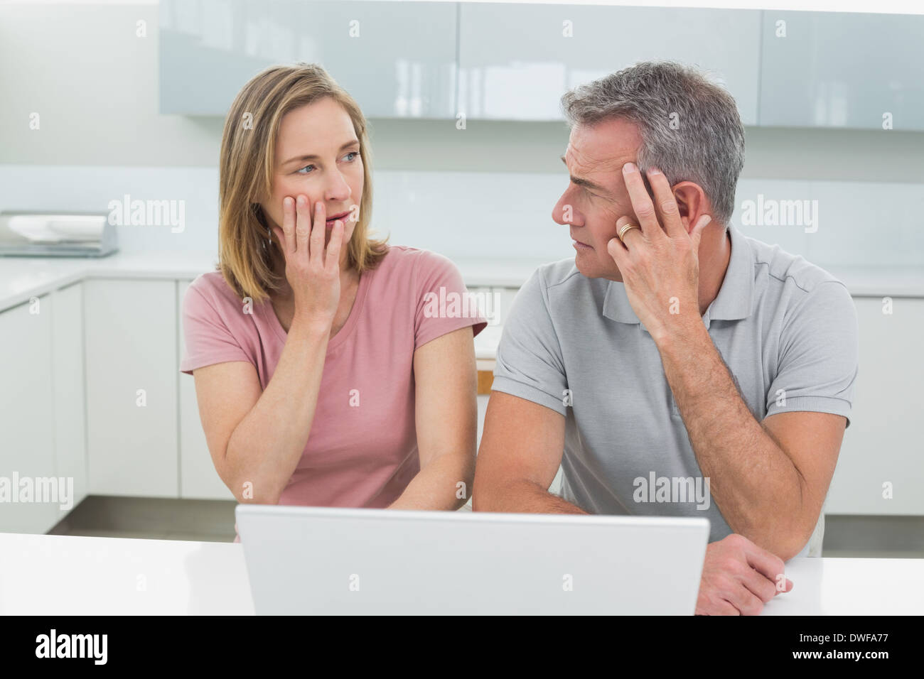Shocked mature woman using hi-res stock photography and images - Alamy