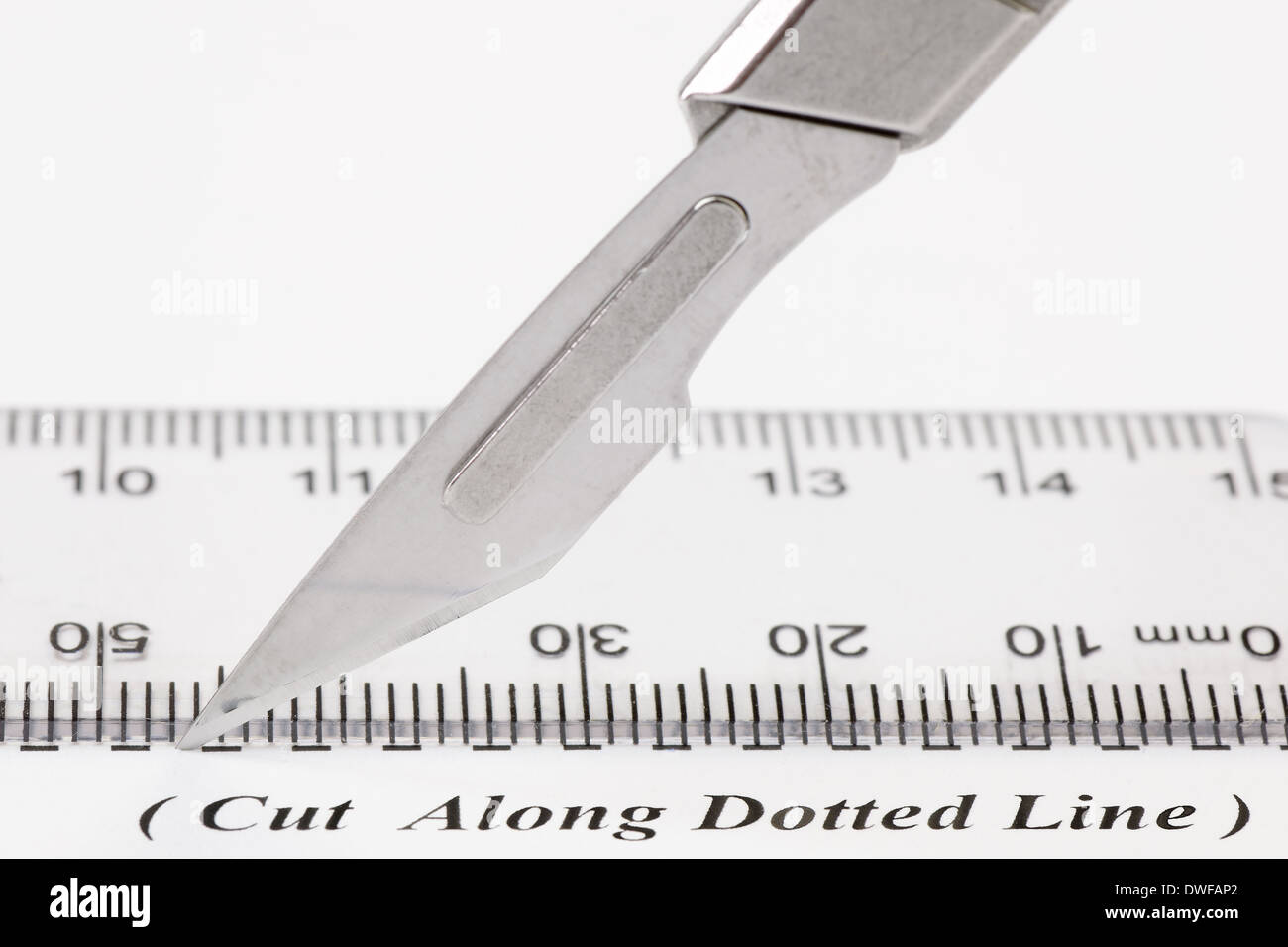 Cutting along dotted line hi-res stock photography and images - Alamy
