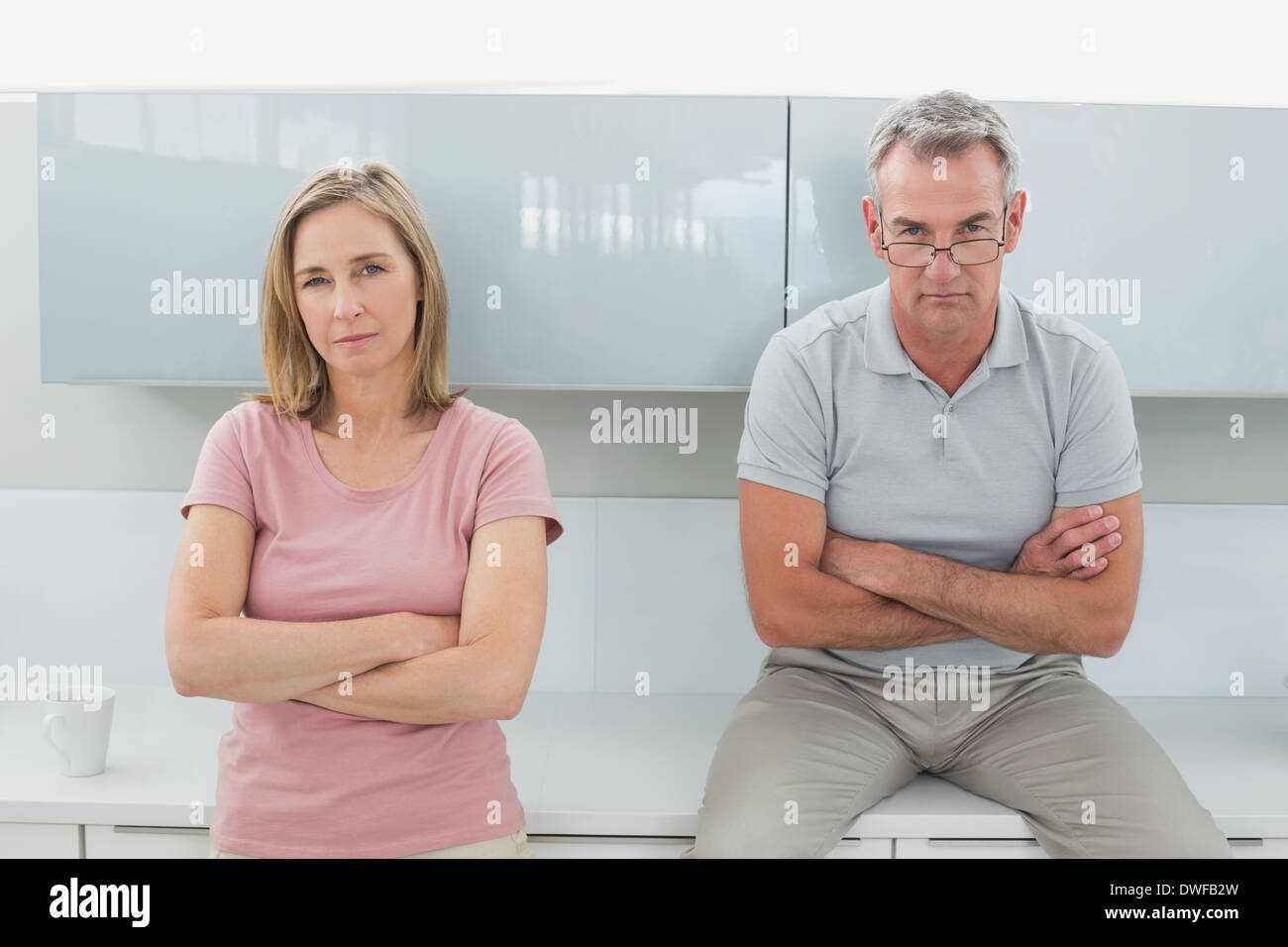 Portrait unhappy adult couple standing hi-res stock photography and ...