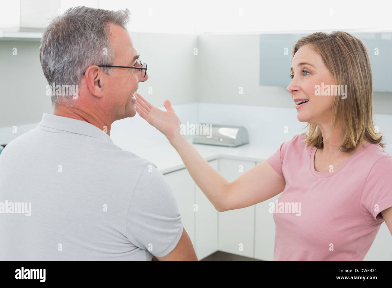 Adult couple having conversation in hi-res stock photography and images ...