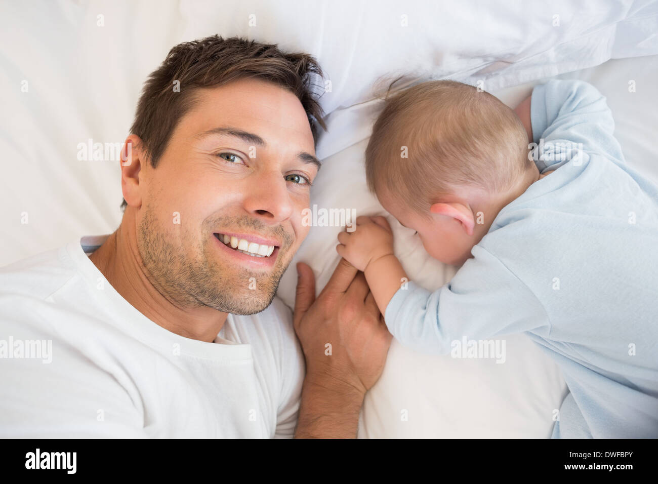 Happy family father son sleeping hi-res stock photography and images ...