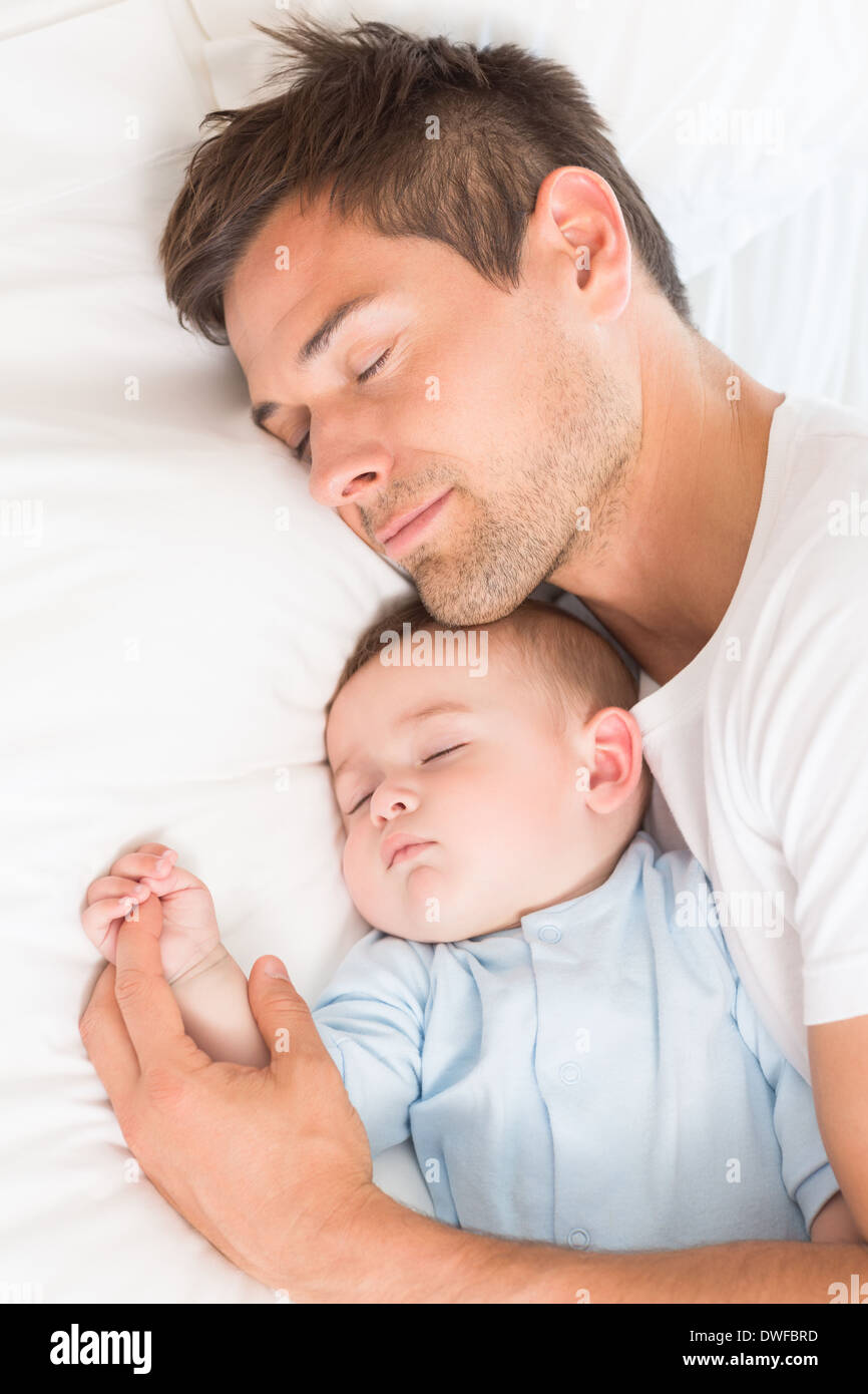 Father son father cuddling sleeping hi-res stock photography and images ...