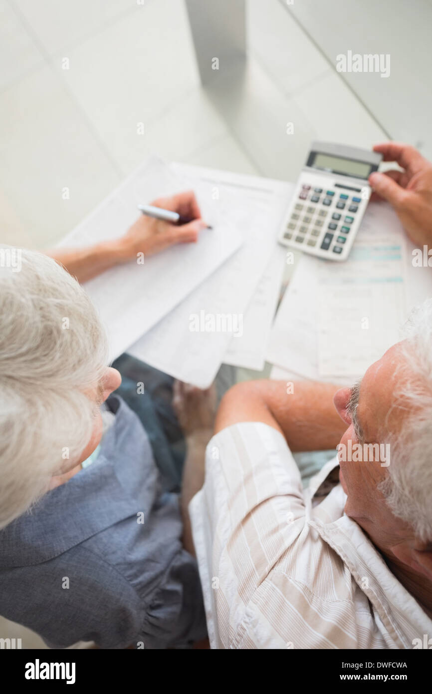 Woman man senior calculator hi-res stock photography and images - Alamy