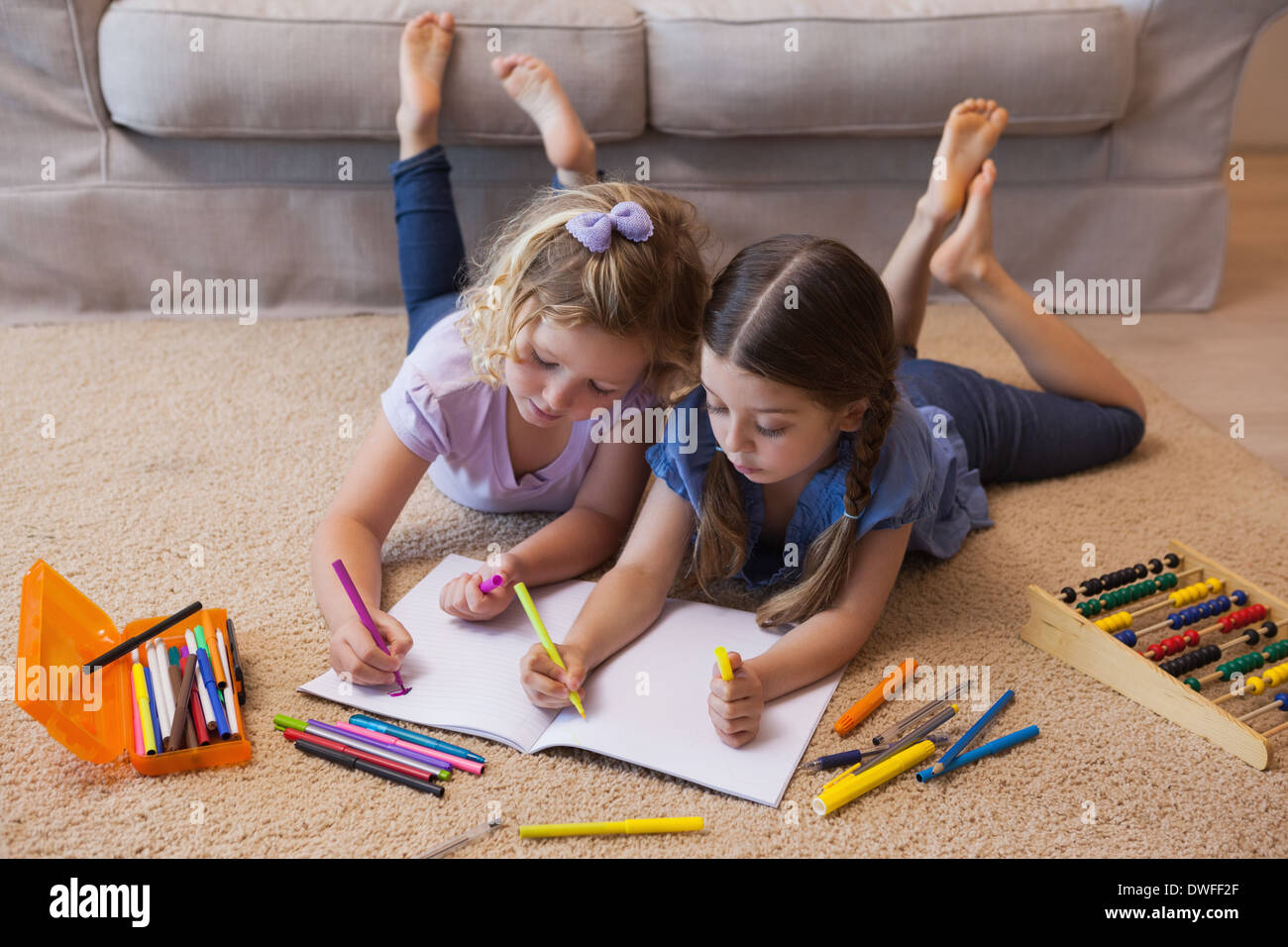 Siblings drawing together in hi-res stock photography and images - Alamy